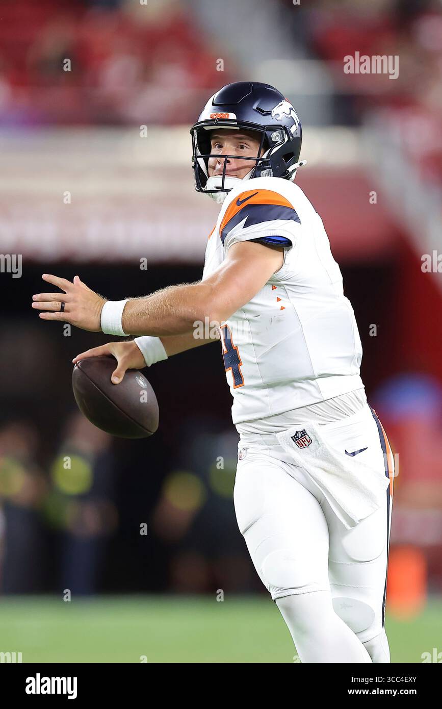 Denver Broncos quarterback Sam Ehlinger (4) prepares to throw during ...