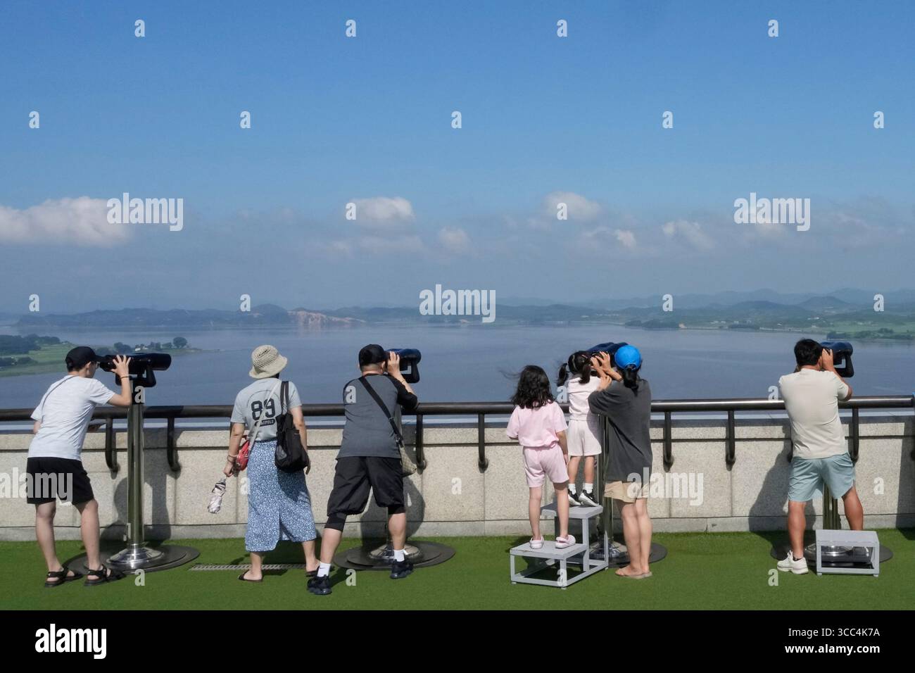 Visitors watch North Korean side from the Unification Observation in ...
