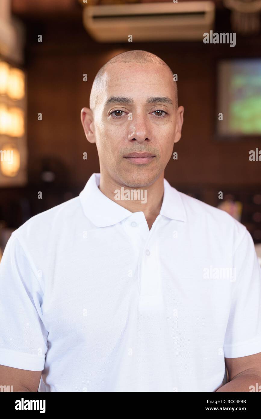 Man wearing white polo hi-res stock photography and images - Alamy