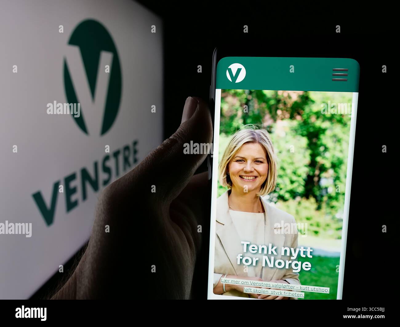 In this photo illustration, a person is holding a smartphone with the ...