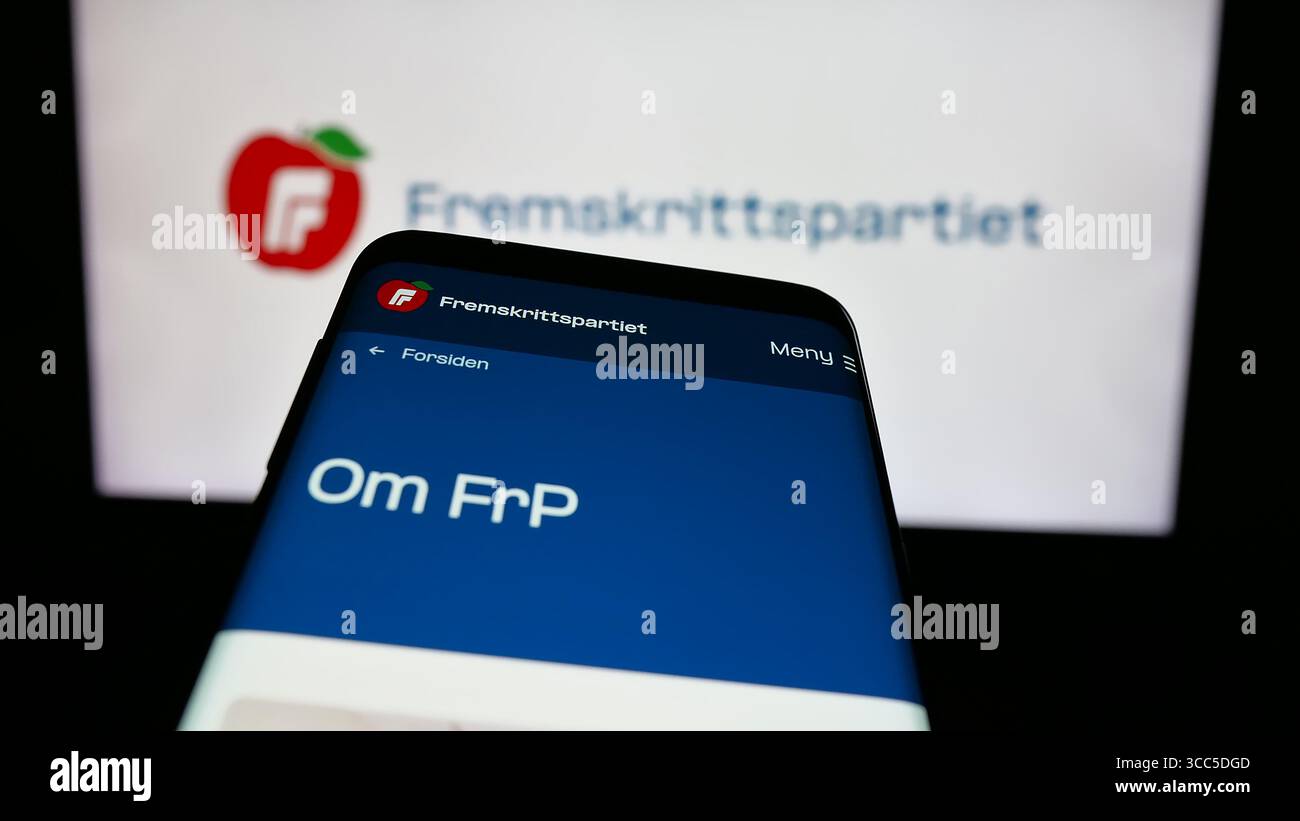 In this photo illustration, a mobile phone with the website of ...