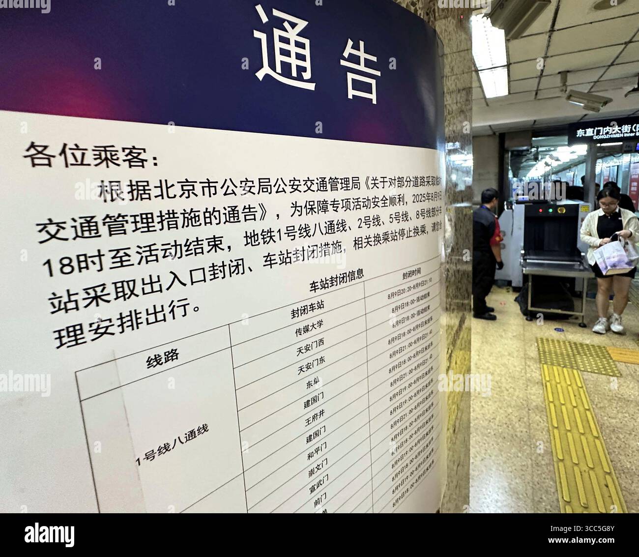 A notice announcing the closure of several stations is posted at a ...