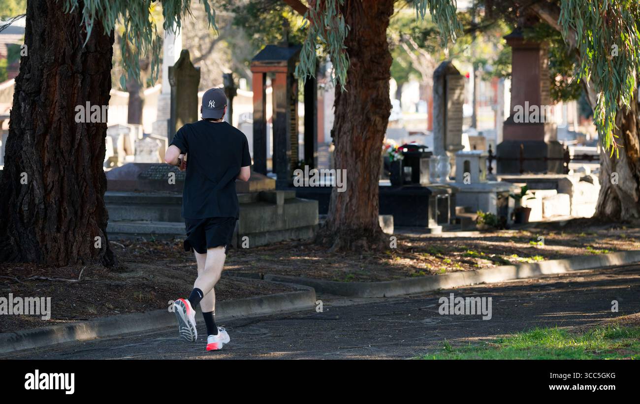 Rear back view jogger during hi-res stock photography and images - Alamy