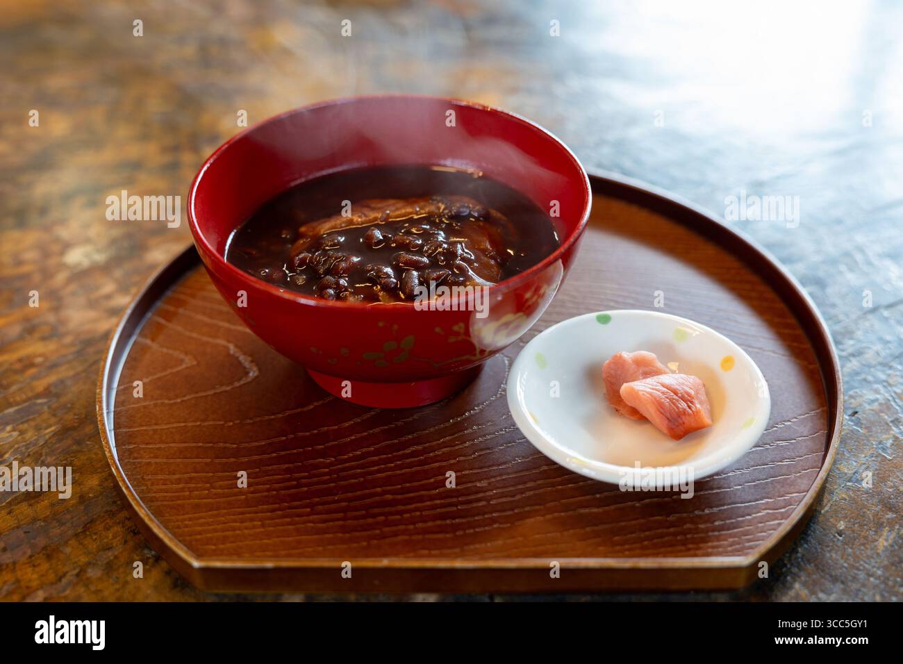 A steaming hot bowl of Zenzai, a comforting Japanese sweet red bean ...