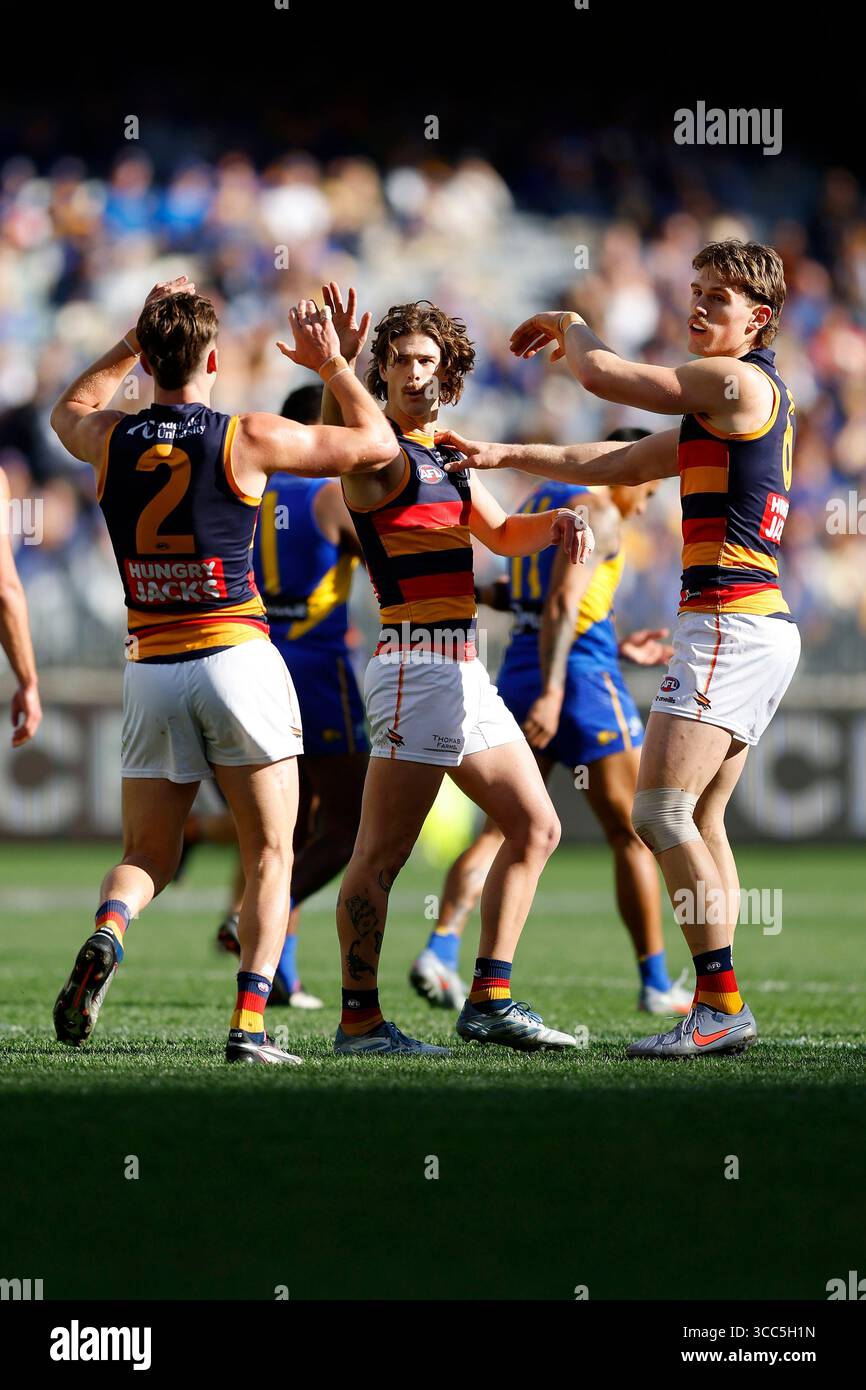 James Peatling high fives his team mates after this goal during the AFL ...