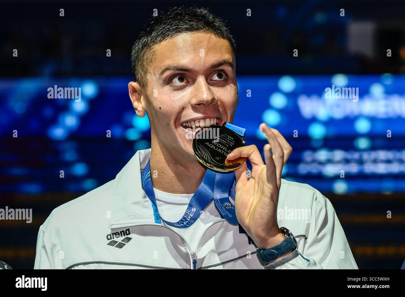 David Popovici of Romania, gold, attends the medal ceremony of the ...