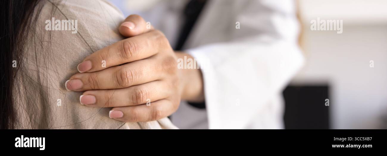 Hand of healthcare professional touching shoulder of patient woman ...