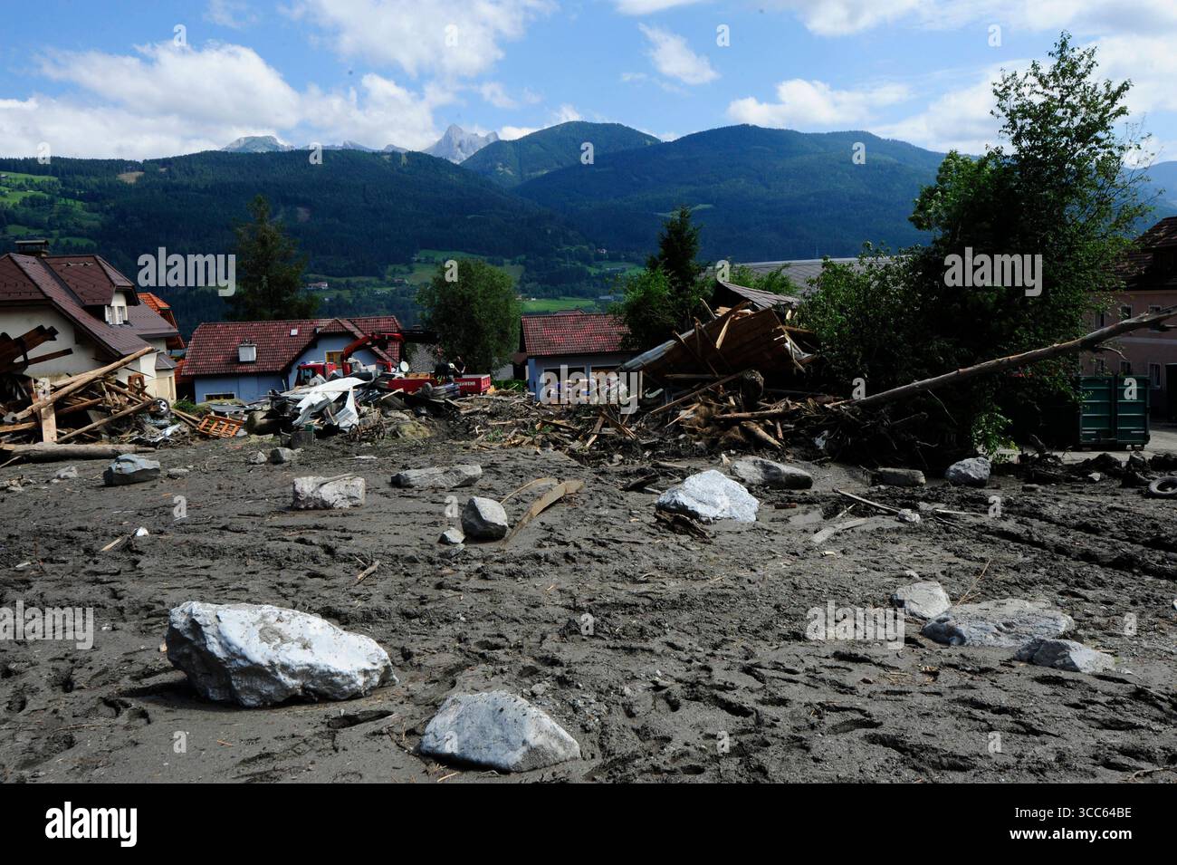 storm damage caused by mudslides, debris and mud after heavy rainfalls ...
