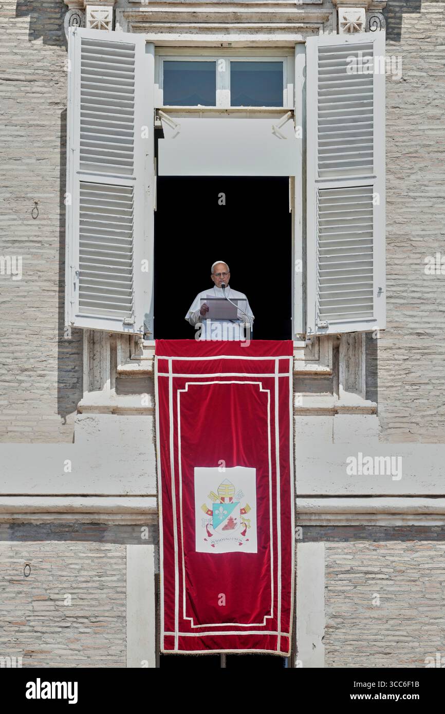 Pope Leo XIV delivers his speech as he recites the Angelus noon prayer ...
