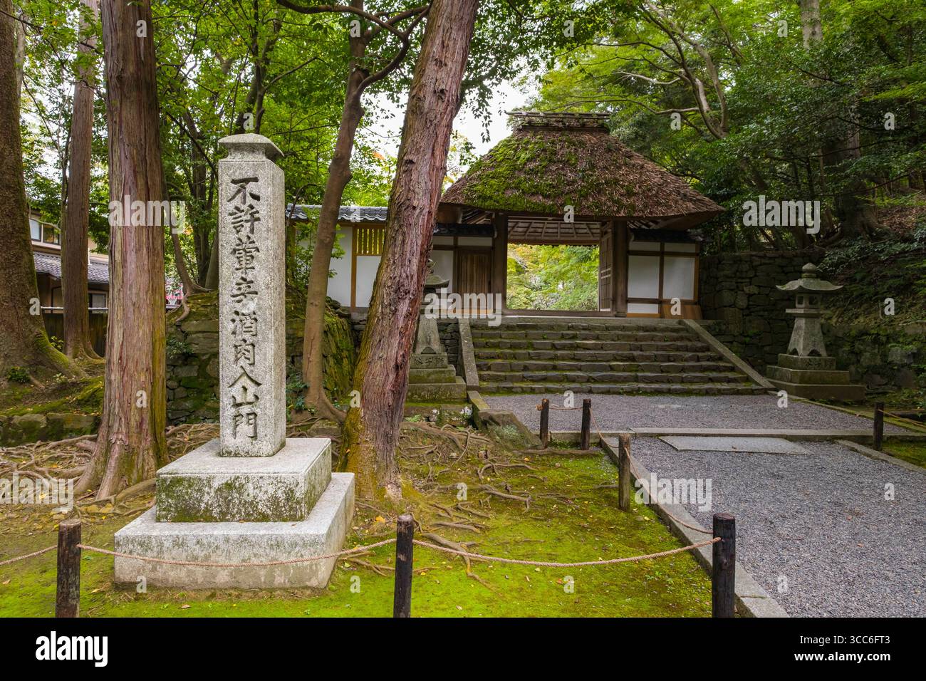 Serene scene of a Japanese garden featuring a traditional stone ...