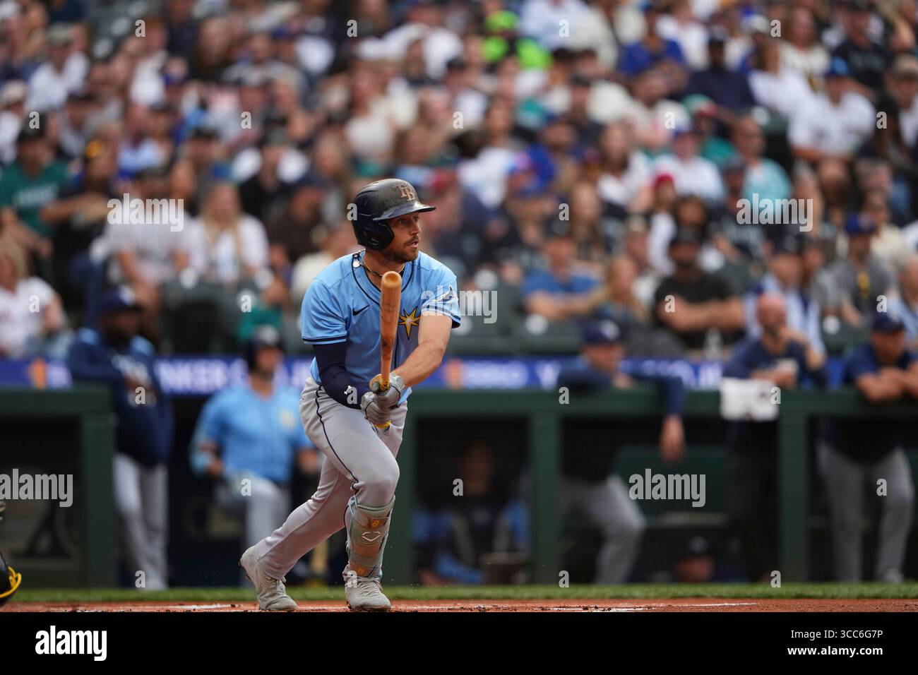 Tampa Bay Rays' Brandon Lowe follows through on a swing against the ...