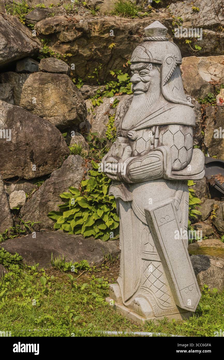 Yeongi-gun, South Korea. July 17, 2020: Stone carved statue of armed ...