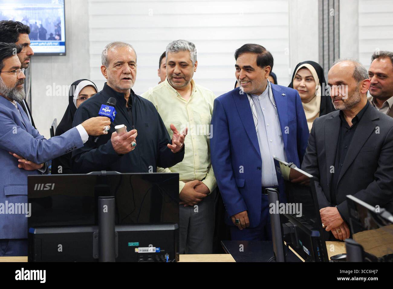 Iranian President Masoud Pezeshkian visits the headquarters of the ...