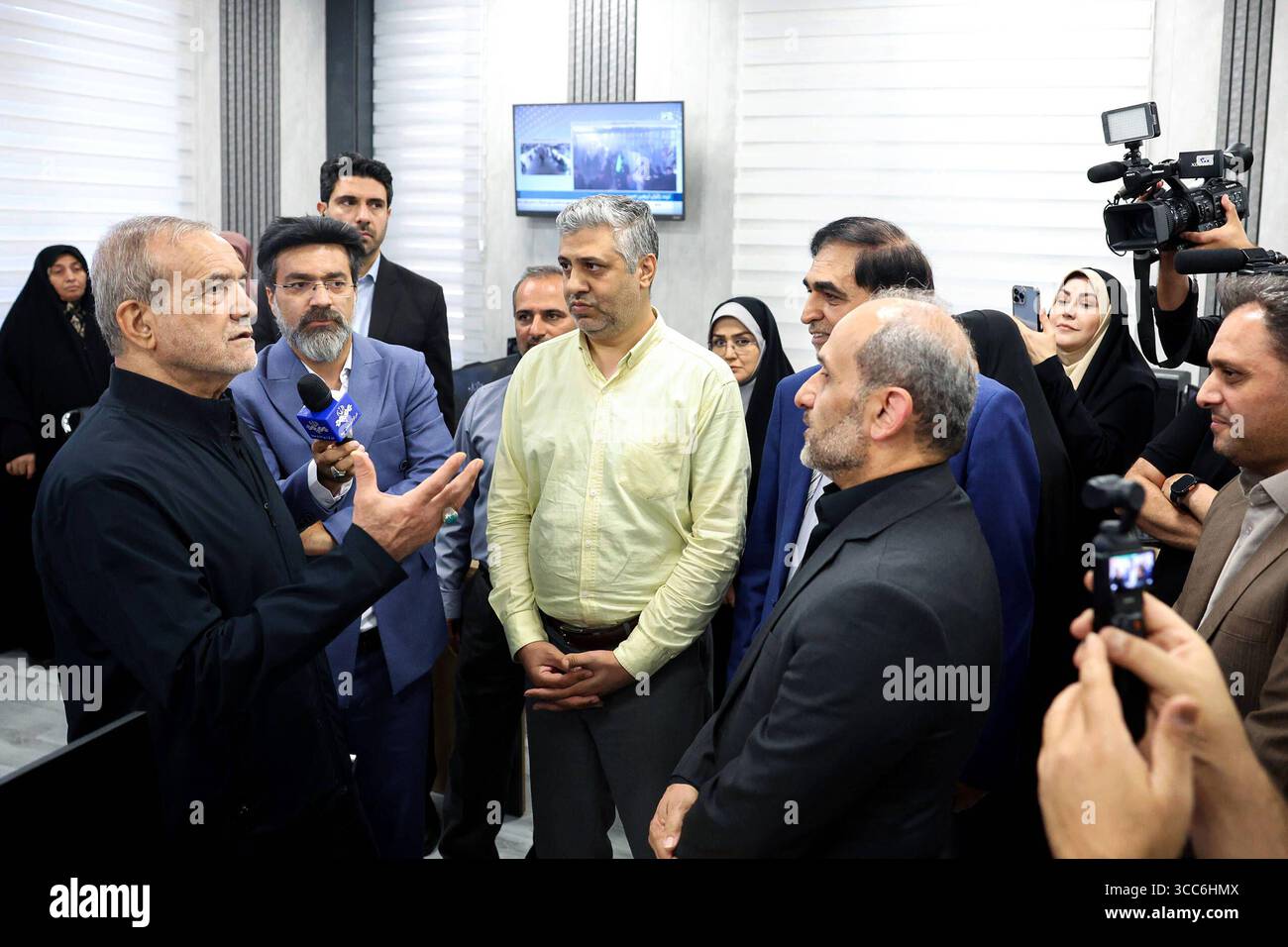 Iranian President Masoud Pezeshkian visits the headquarters of the ...