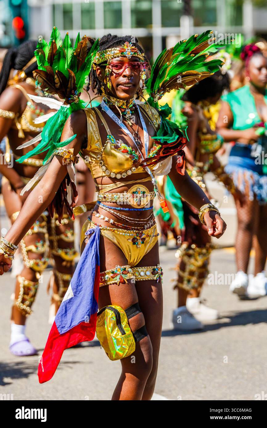 Members of a second Mixed Nation Mas Band in the Cariwest Parade on day ...