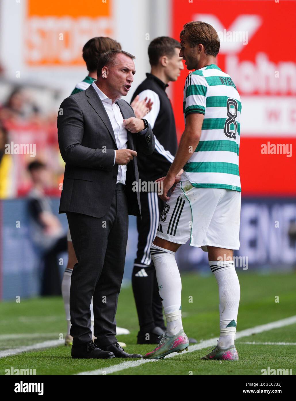 Celtic manager Brendan Rodgers speaks with Benjamin Nygren during the ...