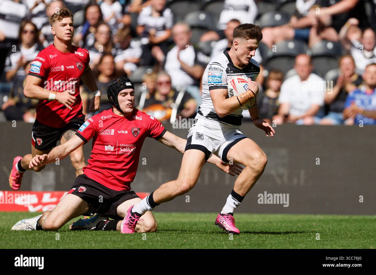 Hull FC's Davey Litten breaks through to score their seventh try during ...