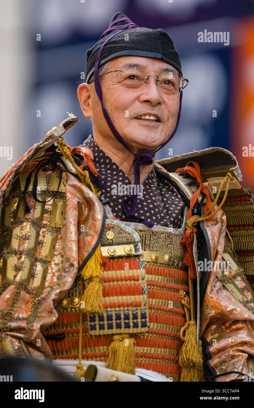 Man dressed as feudal samurai on horseback before the start of the Machida Jidai Festival ...