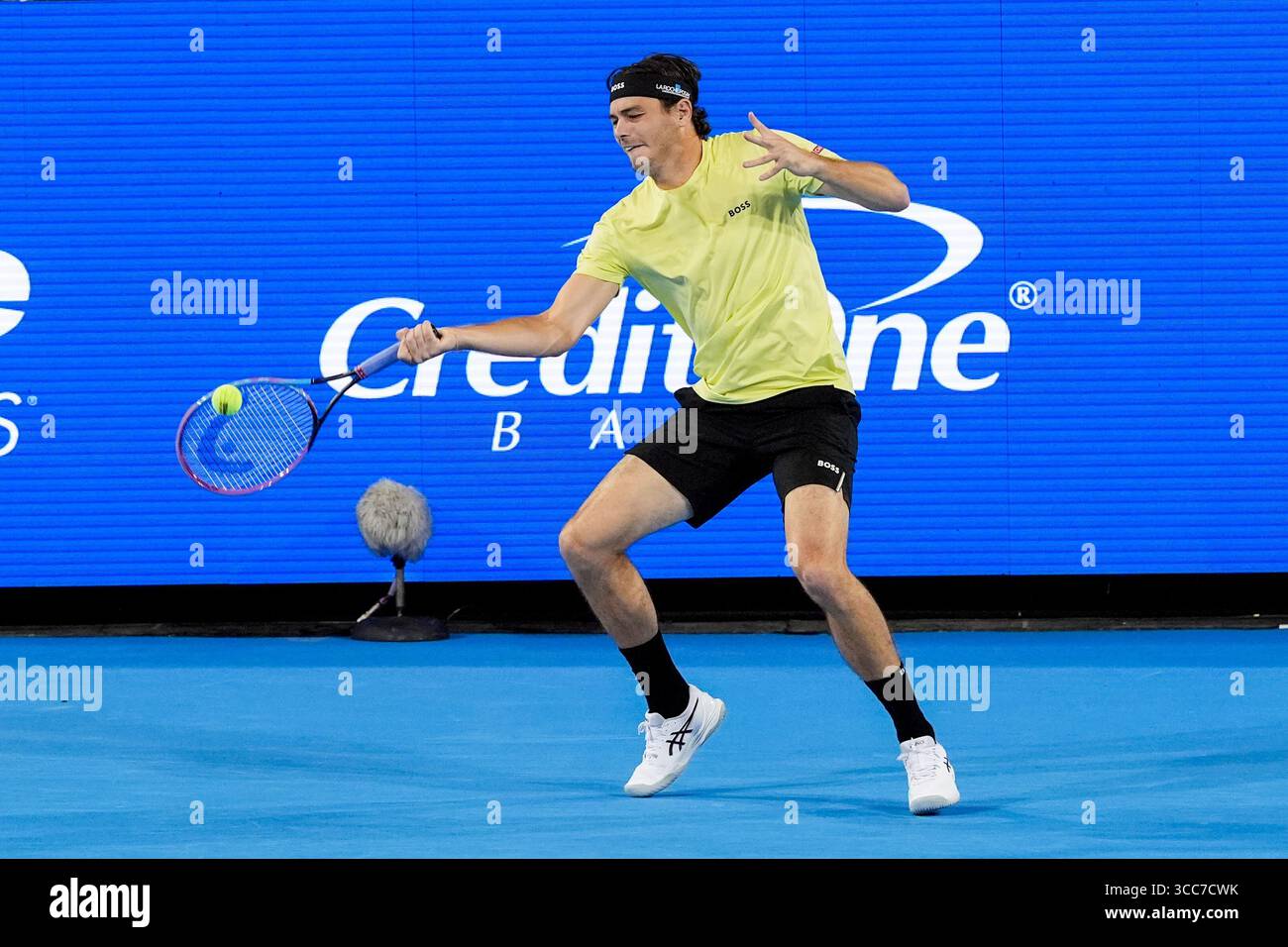 MASON, OH - AUG 9: Taylor Fritz (USA) returns a shot to Emilio Nava ...
