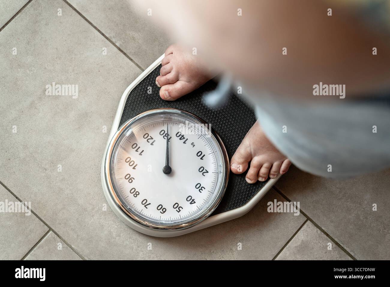 Bavaria, Germany - August 10, 2025: An adult woman stands barefoot on a ...