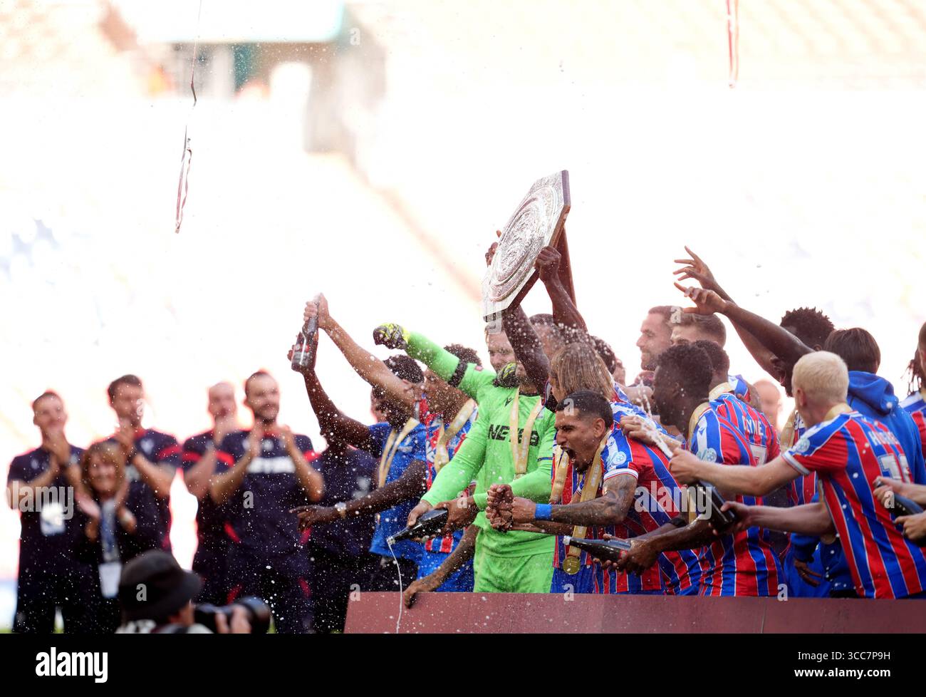 Crystal Palace players celebrate with the Community Shield trophy ...
