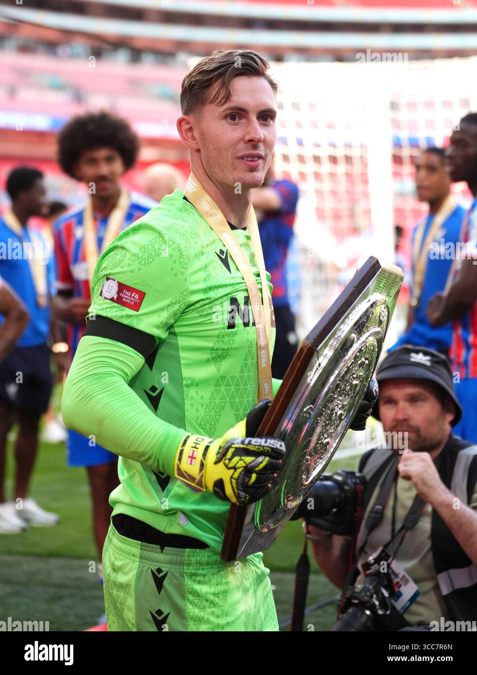 Crystal Palace goalkeeper Dean Henderson lifts the Community Shield ...