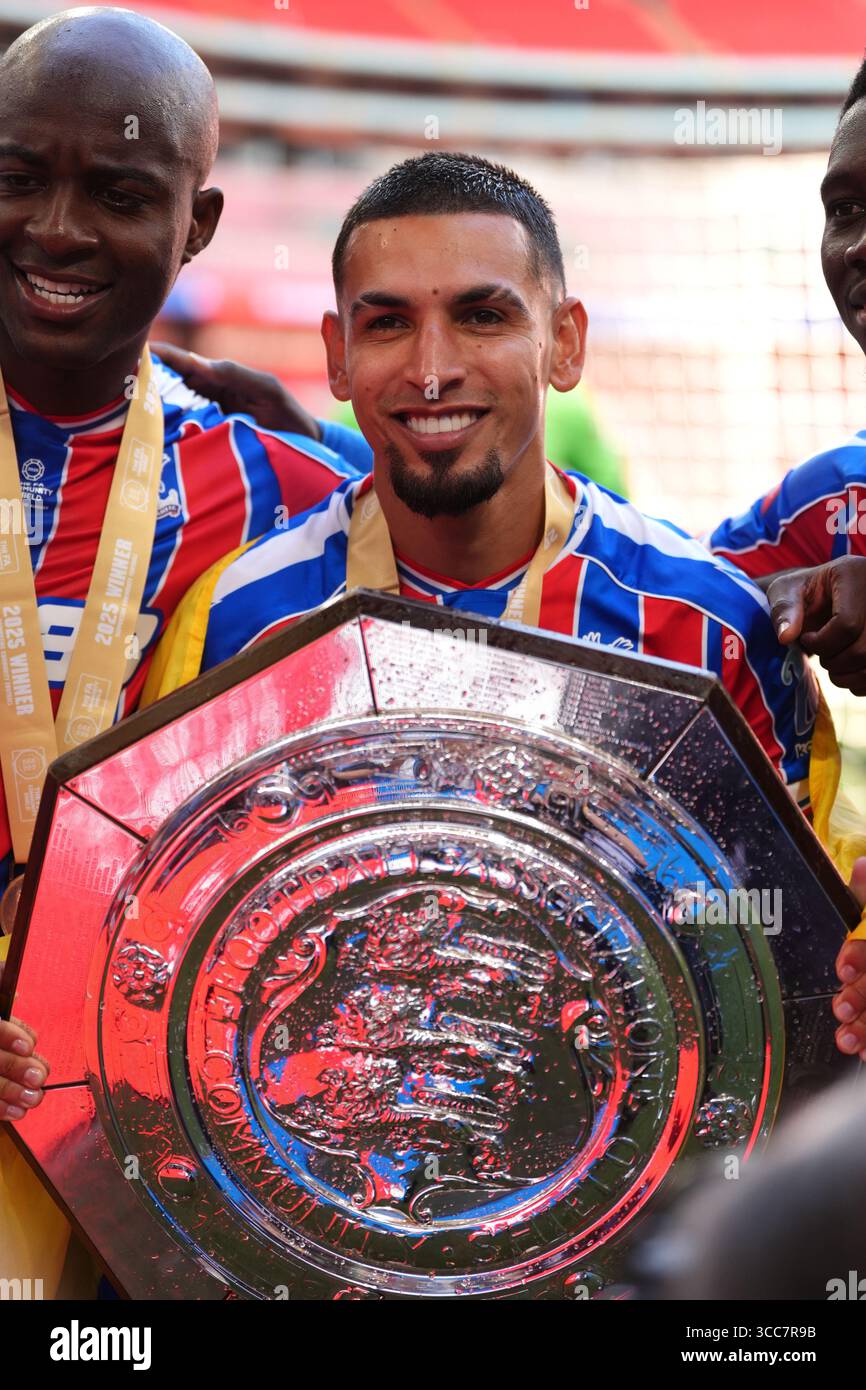 Crystal Palace's Daniel Munoz lifts the Community Shield trophy ...