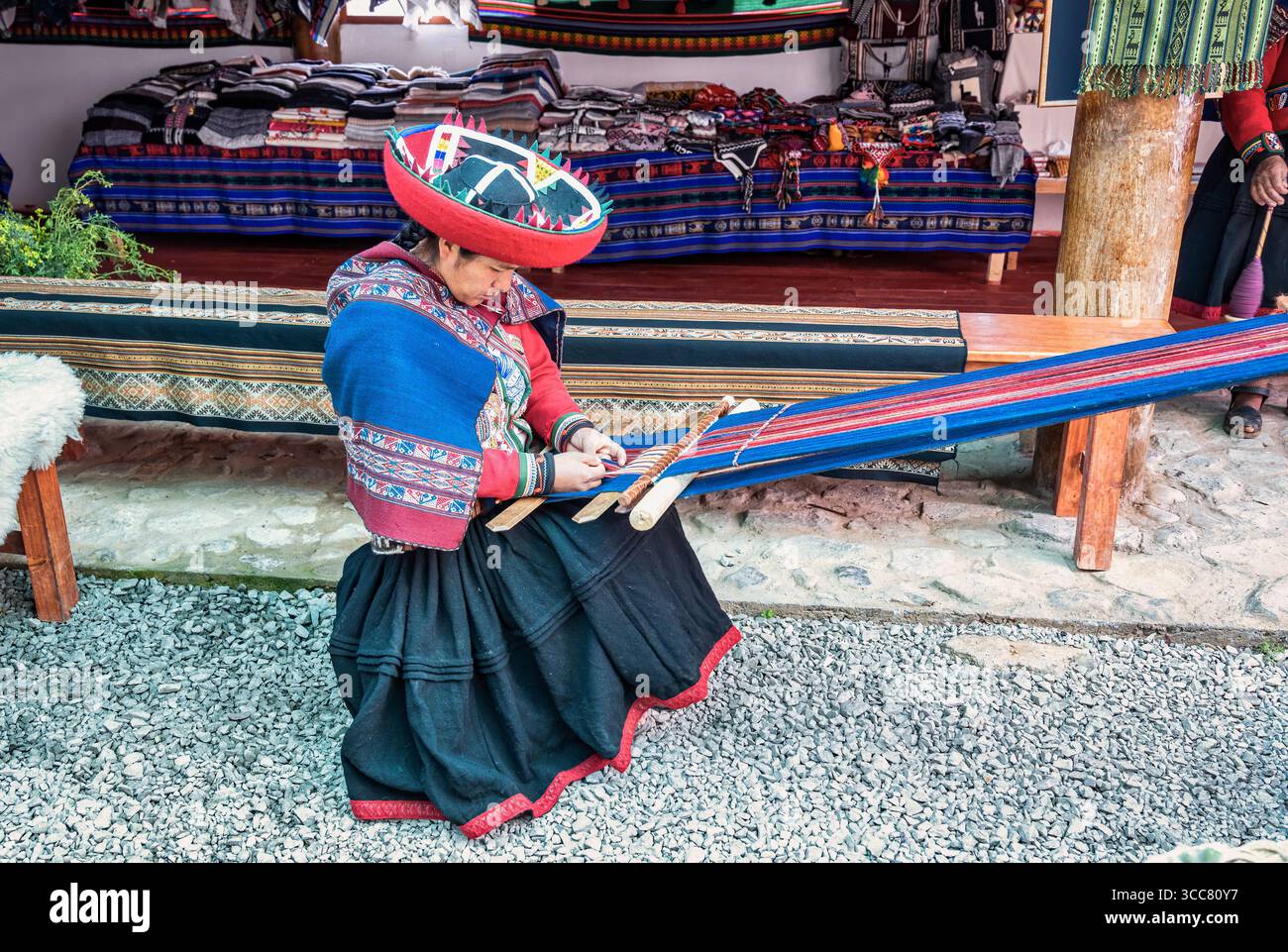 Cusco, Peru - March 15, 2025: Andean woman weaving traditional textiles ...
