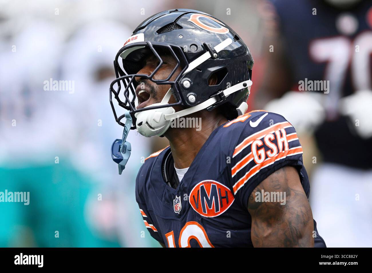 Chicago Bears wide receiver Maurice Alexander reacts after scoring a ...