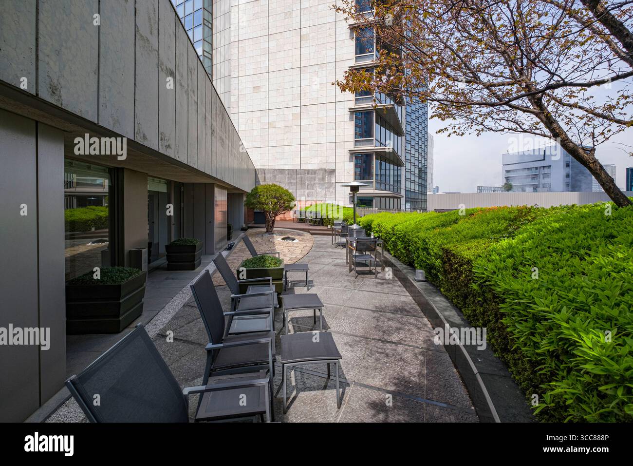 Outdoor seating at the Grand Club private lounge located on the 10th ...