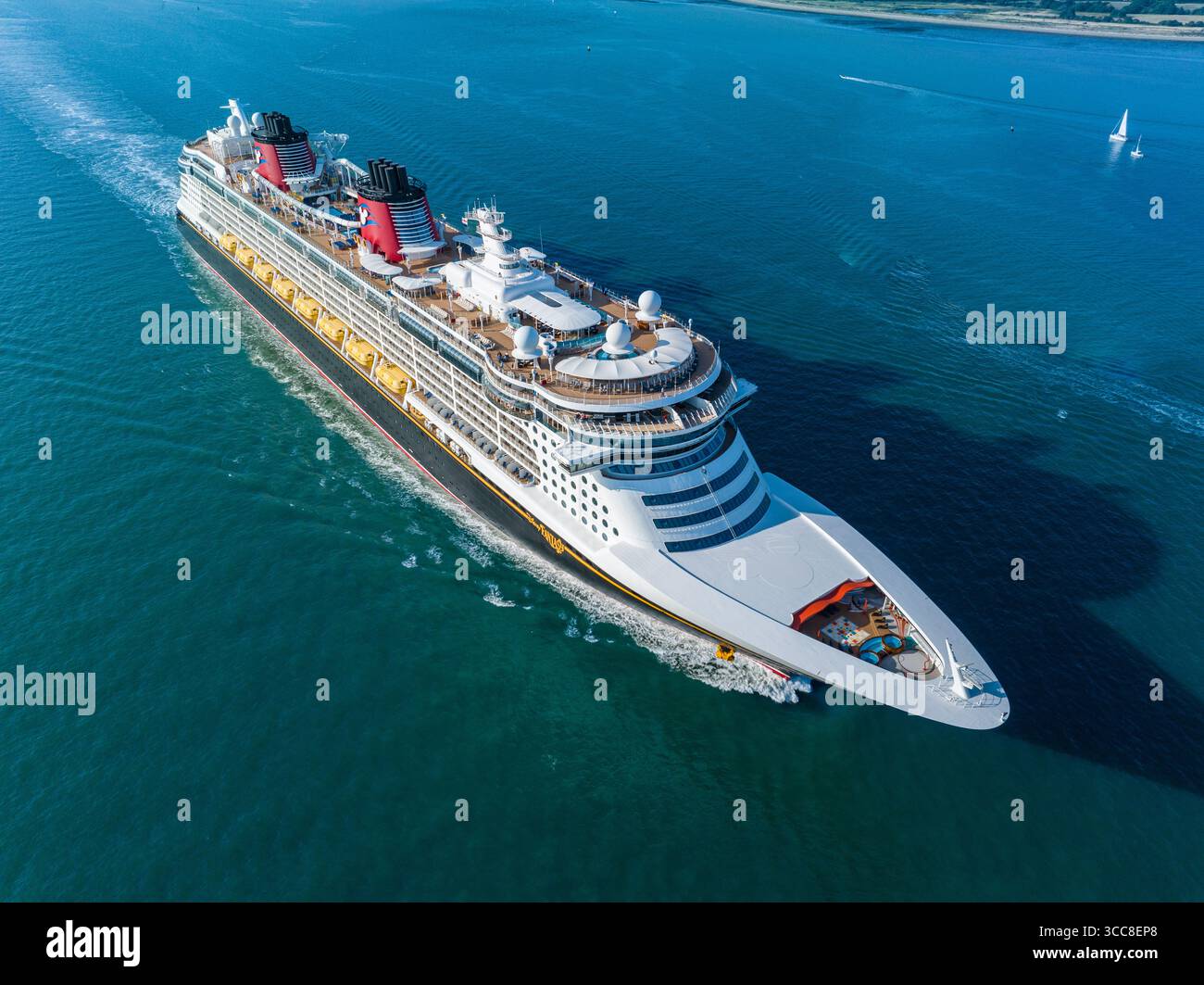 Disney Fantasy cruise ship gliding on a sunny day, showcasing its ...