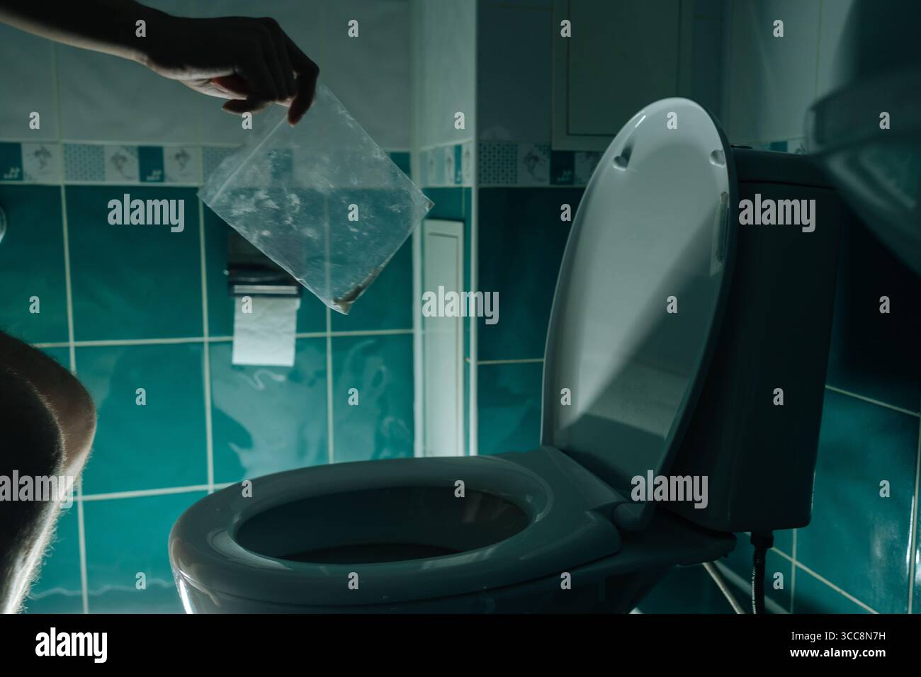 Hand flushing a toilet hi-res stock photography and images - Alamy