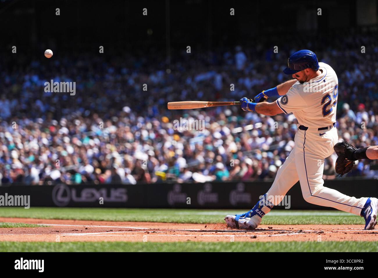 Seattle Mariners designated hitter Cal Raleigh hits a two-run home run ...