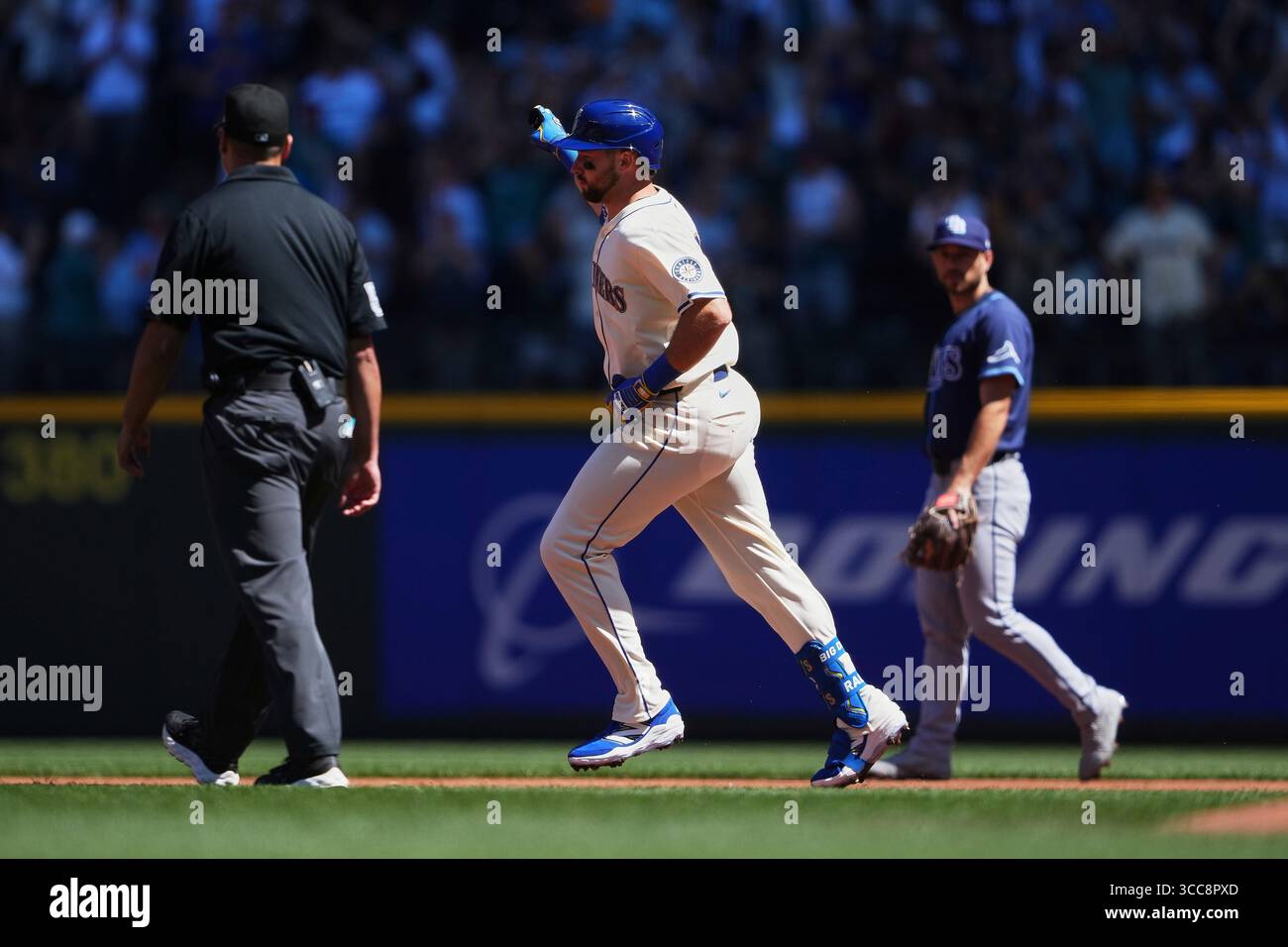 Seattle Mariners designated hitter Cal Raleigh rounds the bases after ...