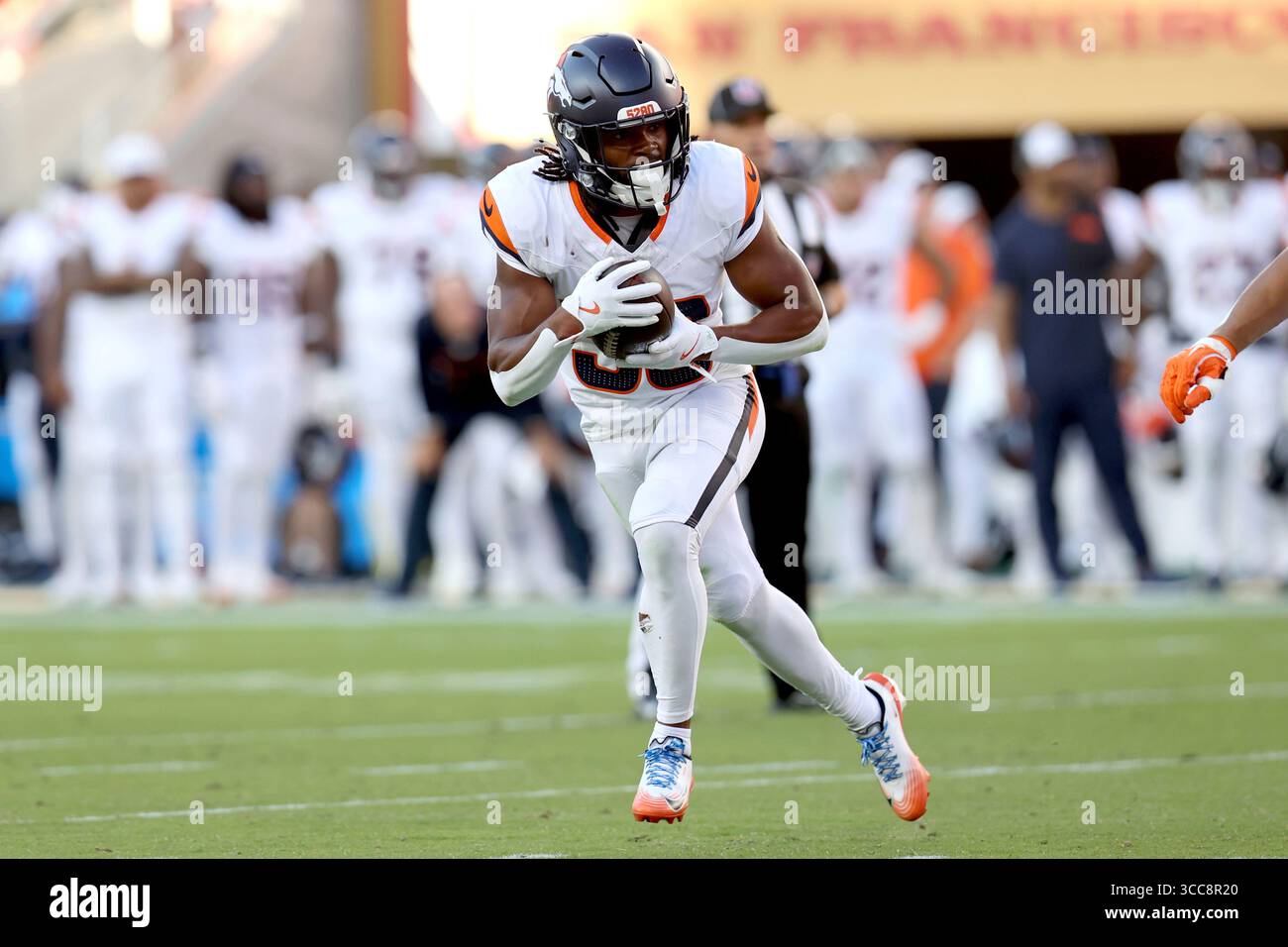Denver Broncos running back Jaleel McLaughlin (38) runs during an NFL ...