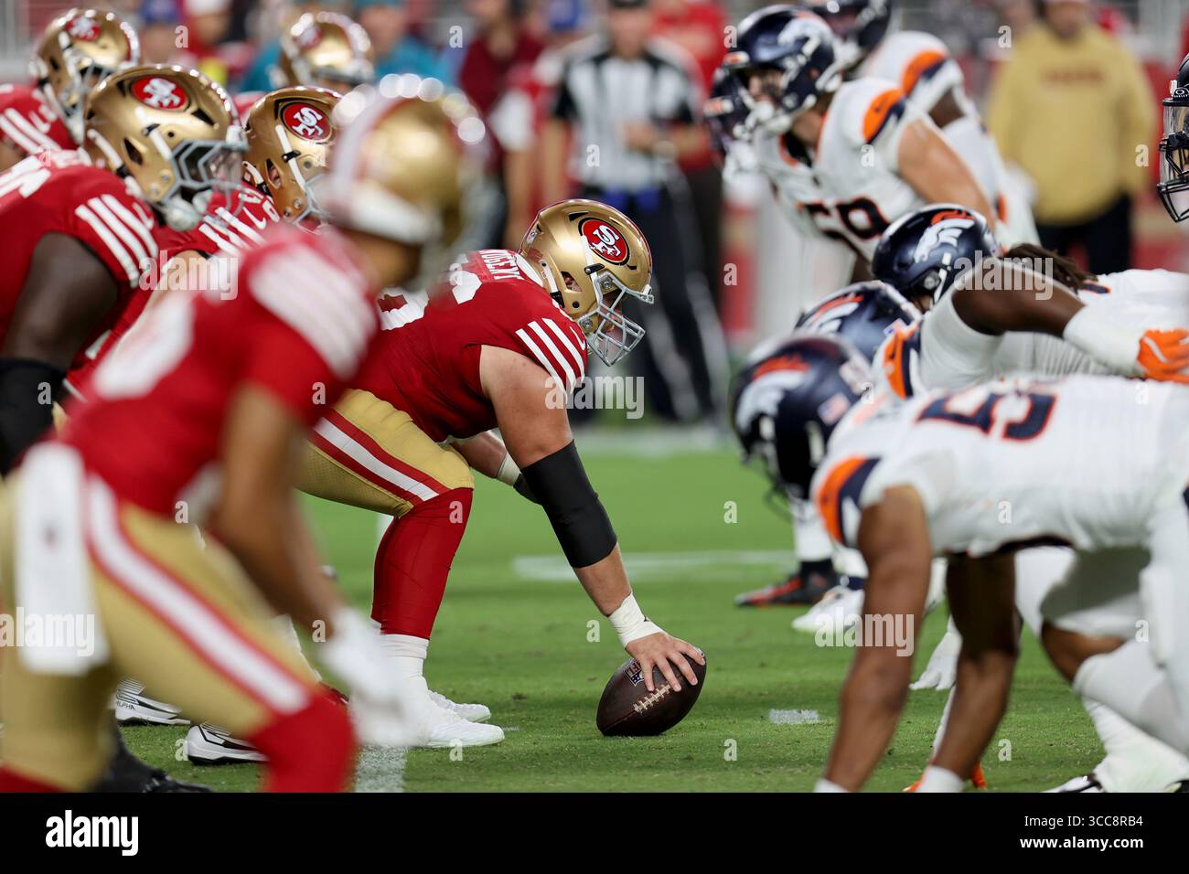 San Francisco 49ers center Drake Nugent (66) snaps the ball during an ...