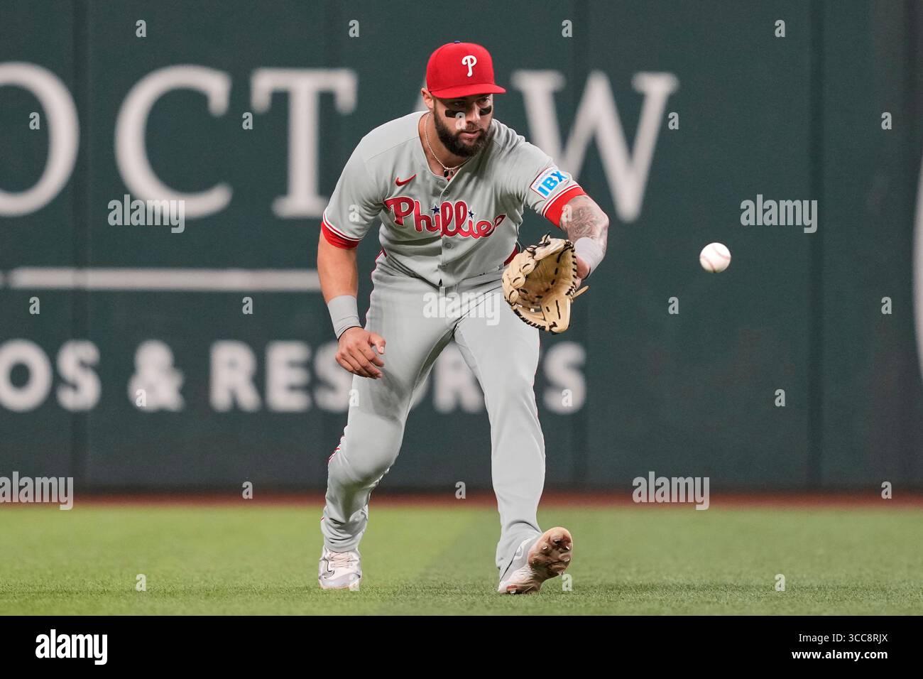 Philadelphia Phillies left fielder Weston Wilson reaches out to grab a ...