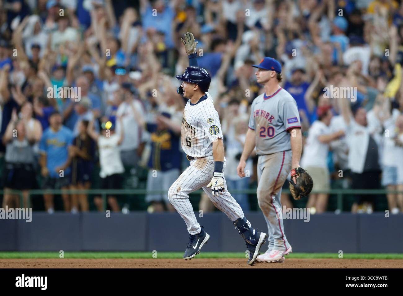 MILWAUKEE, WI - AUGUST 10: Isaac Collins #6 of the Milwaukee Brewers ...