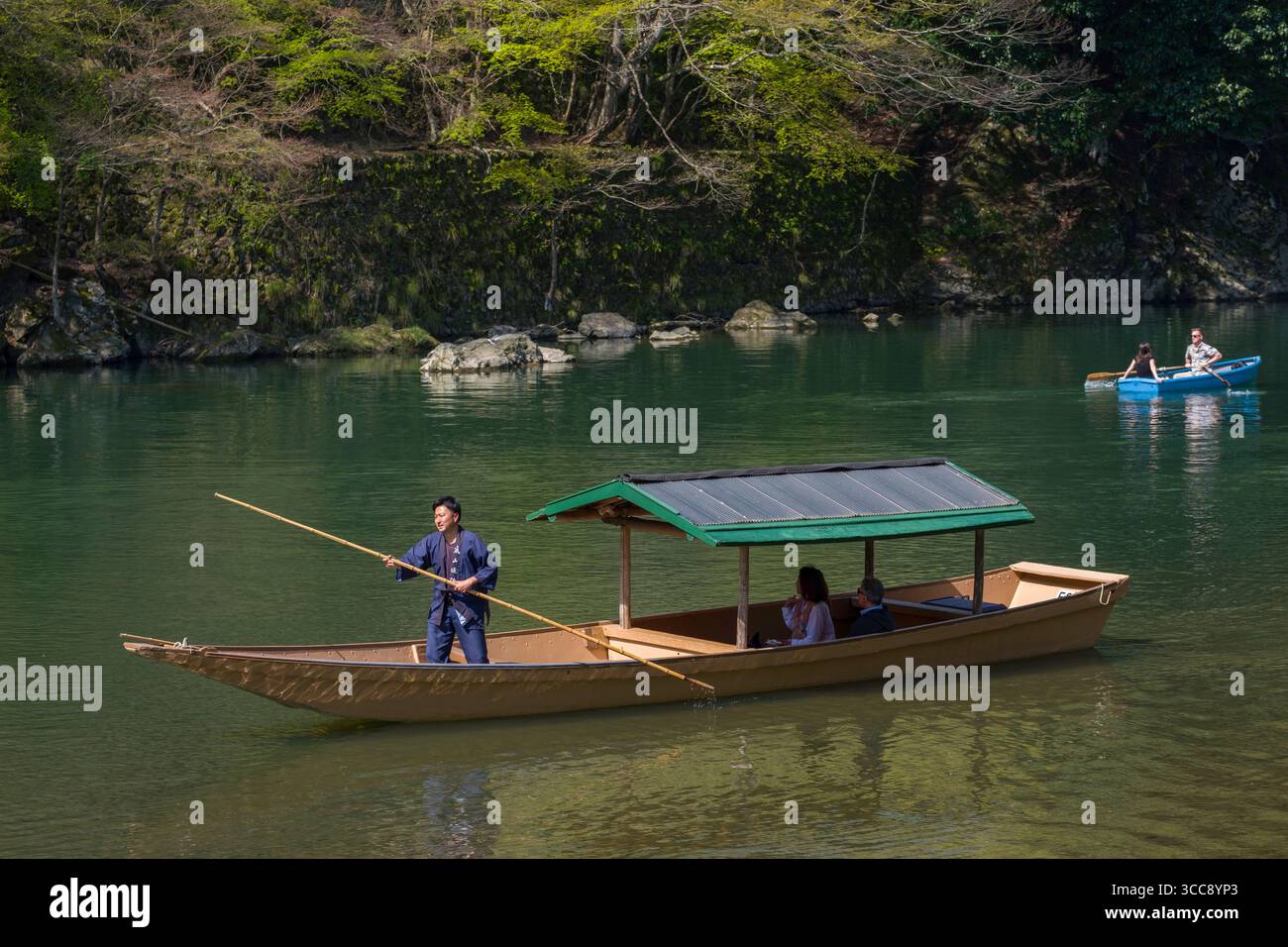 Traditional Japanese flat bottom tour boat on the Katsura River ...