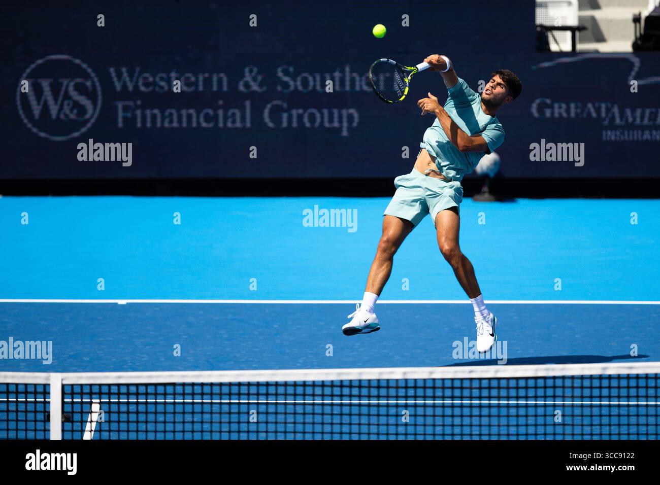 MASON, OHIO - AUGUST 10: Carlos Alcaraz of Spain hits an overhead ...