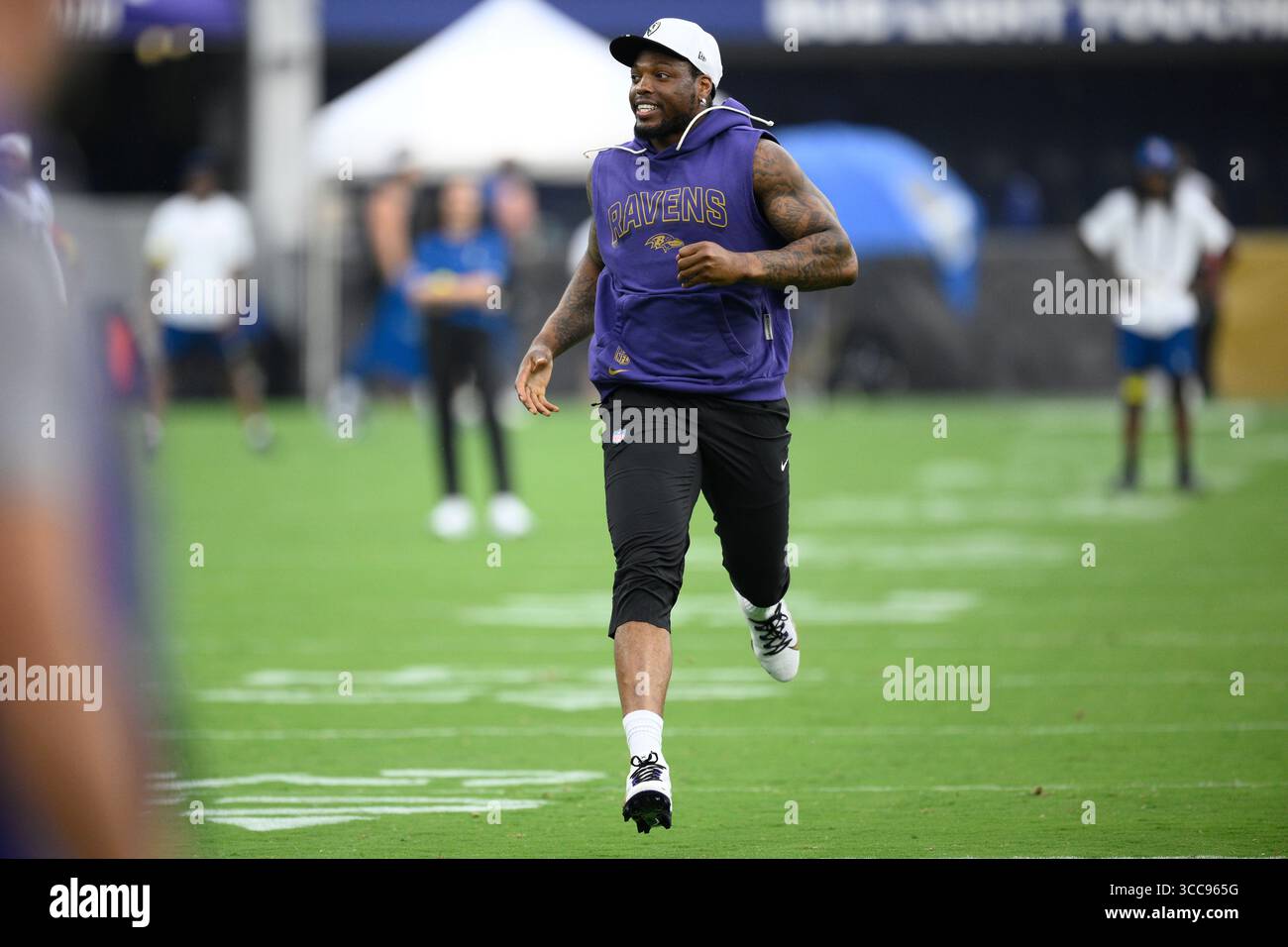Baltimore Ravens running back Derrick Henry (22) works out before a ...