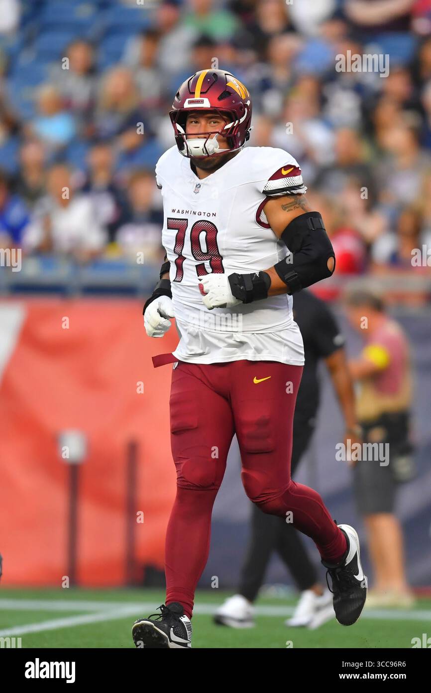Washington Commanders offensive tackle Foster Sarell (79) steps on the ...