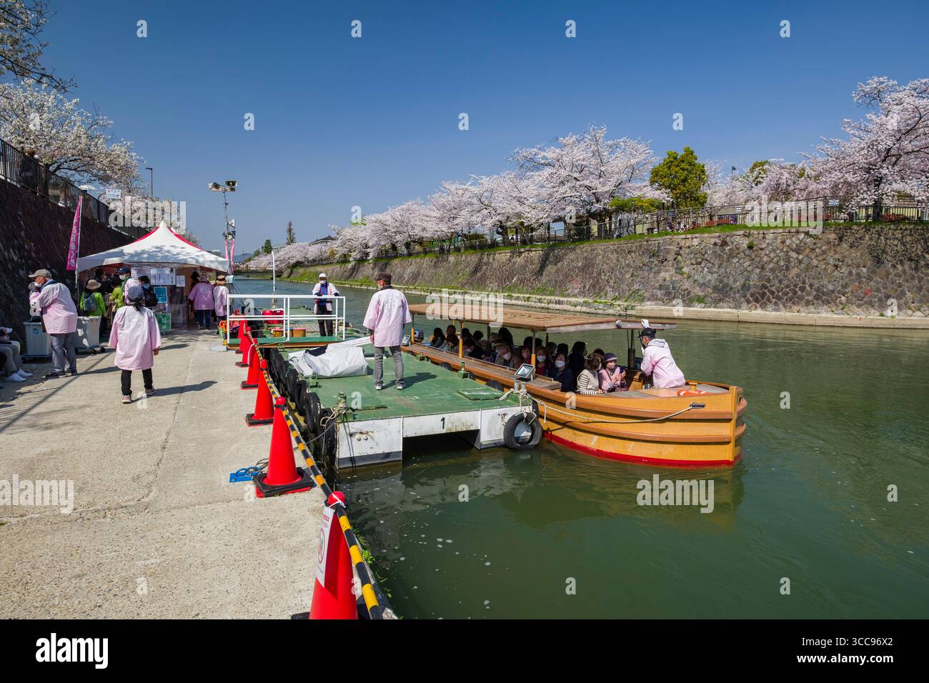 Tour boat at dock for the Okazaki Sakura Corridor Jukokubune Tour ...