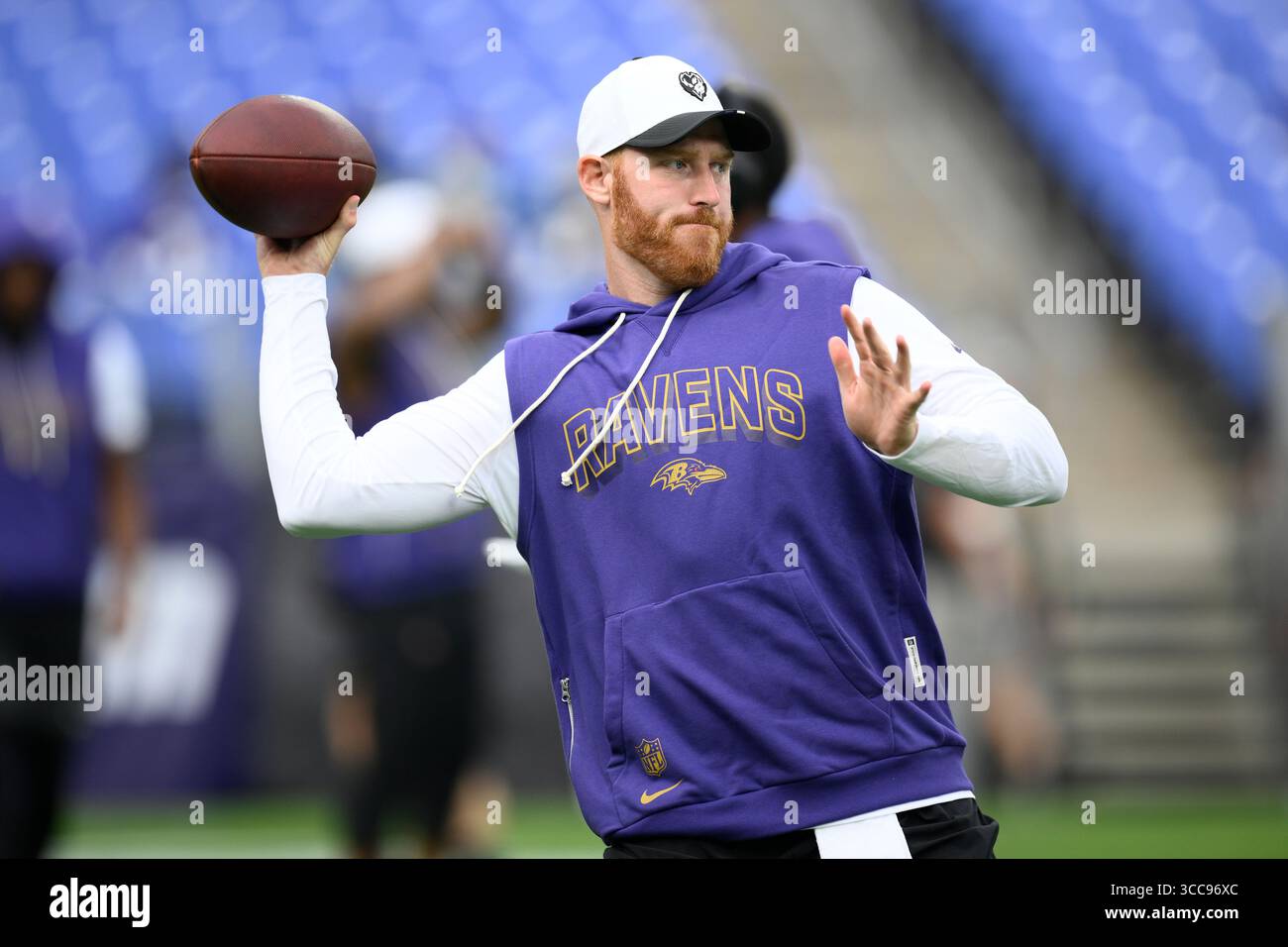 Baltimore Ravens quarterback Cooper Rush (15) works out before a ...