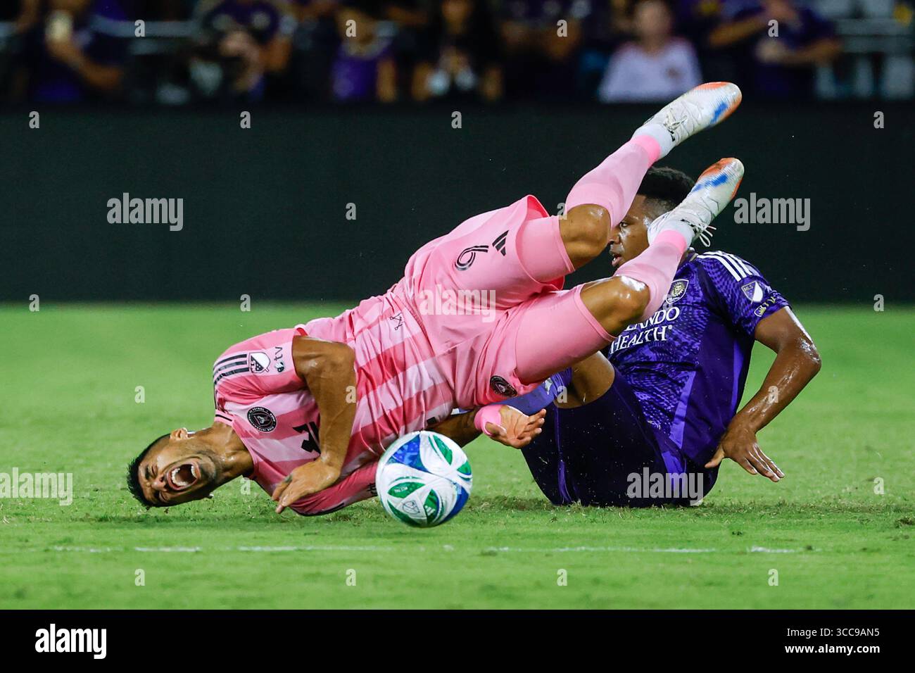 Orlando City defender Alex Freeman, right, slides into Inter Miami ...