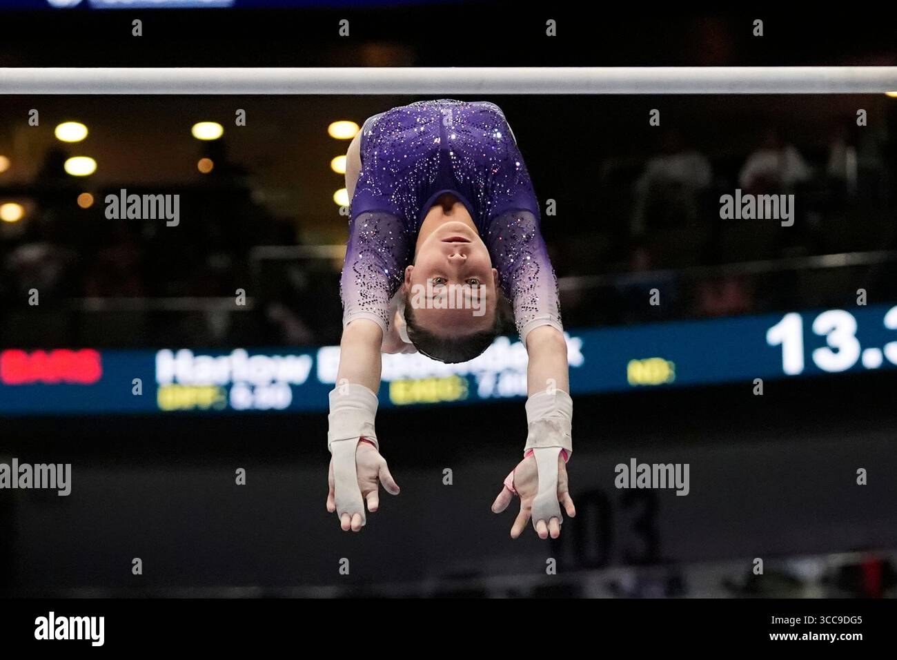 Claire Pease of WOGA competes on the uneven bars during the senior ...