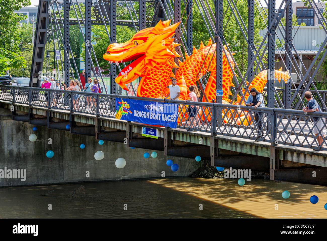 A dragon mascot balloon on the Wells Street Bridge over the St. Joseph ...