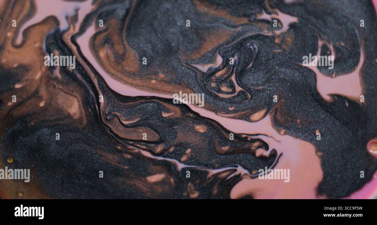 Defocused emulsion spill circling fluid hi-res stock photography and ...