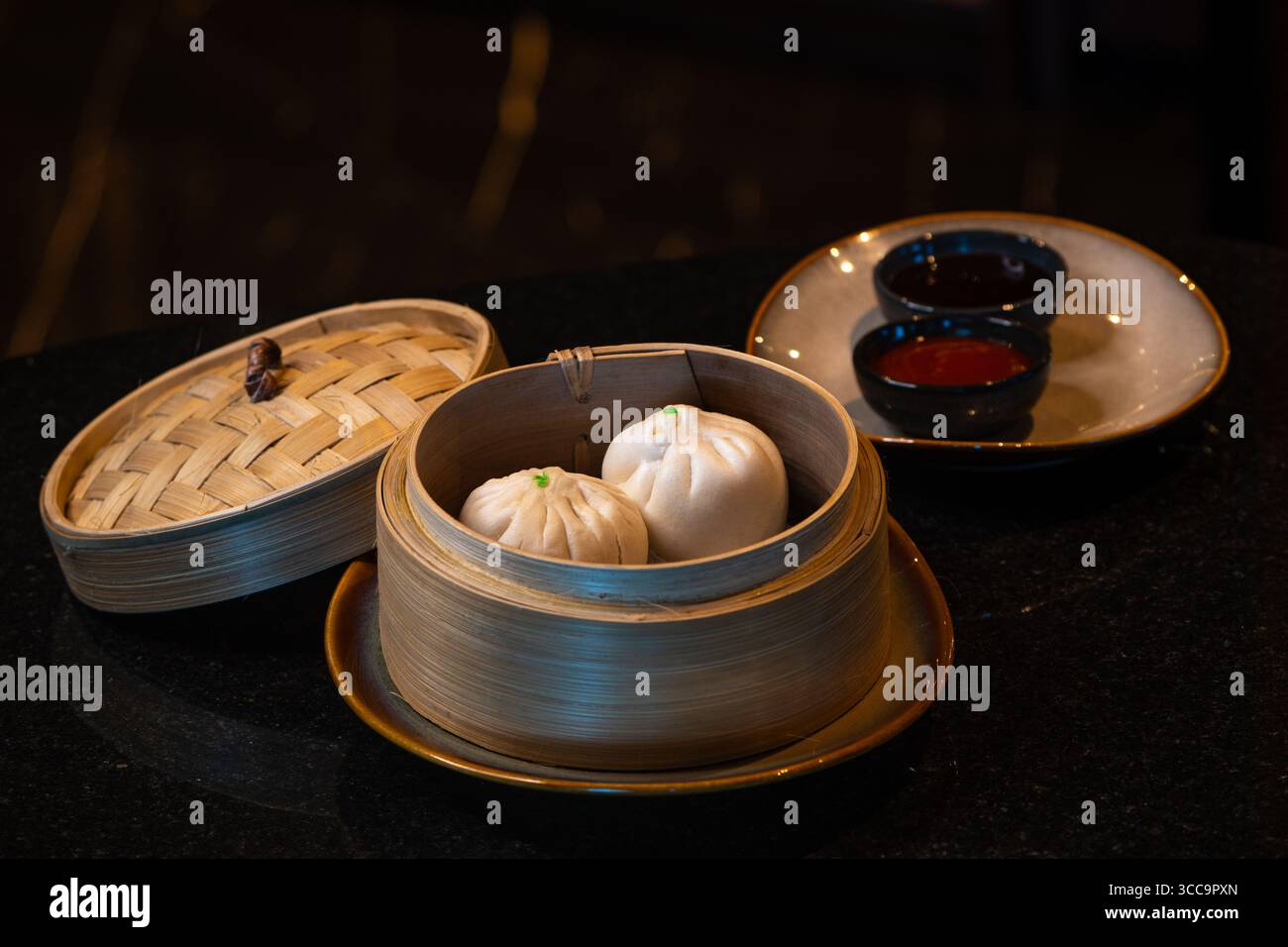 Traditional Dim Sum in Bamboo steamers Stock Photo - Alamy