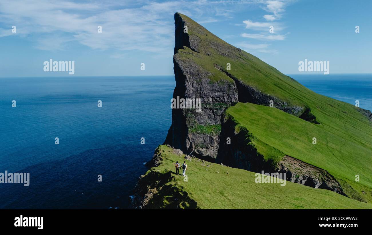 Discover the breathtaking Mylingur cliffs of the Faroe Islands, where ...